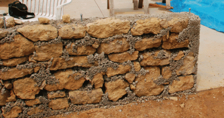 BUILDING YOUR OWN ROCK WALL USING SLIP FORM part 2 – Digging in the ...