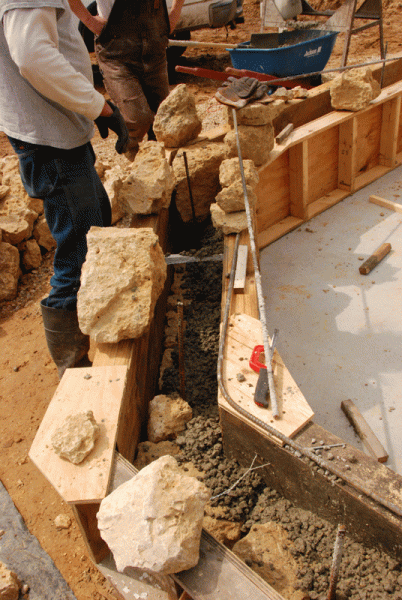 BUILDING A ROCK WALL USING SLIP-FORM part 1 – Digging in the Driftless